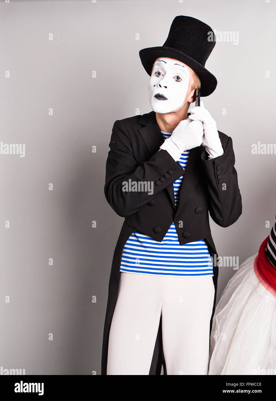 mime with smartphone. Concept of April Fools Day Stock Photo - Alamy