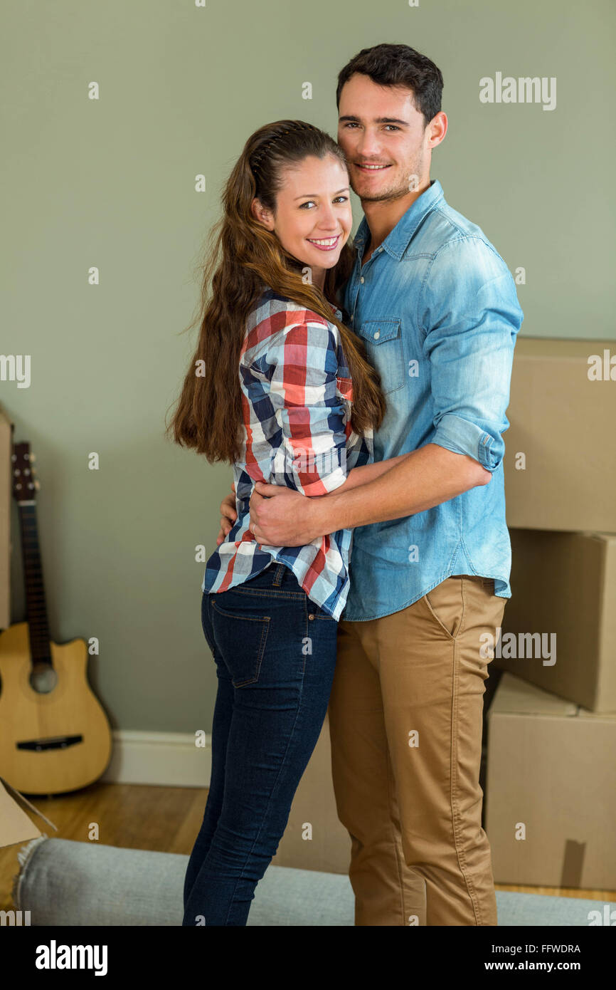 Romantic couple standing face to face and embracing each other Stock ...
