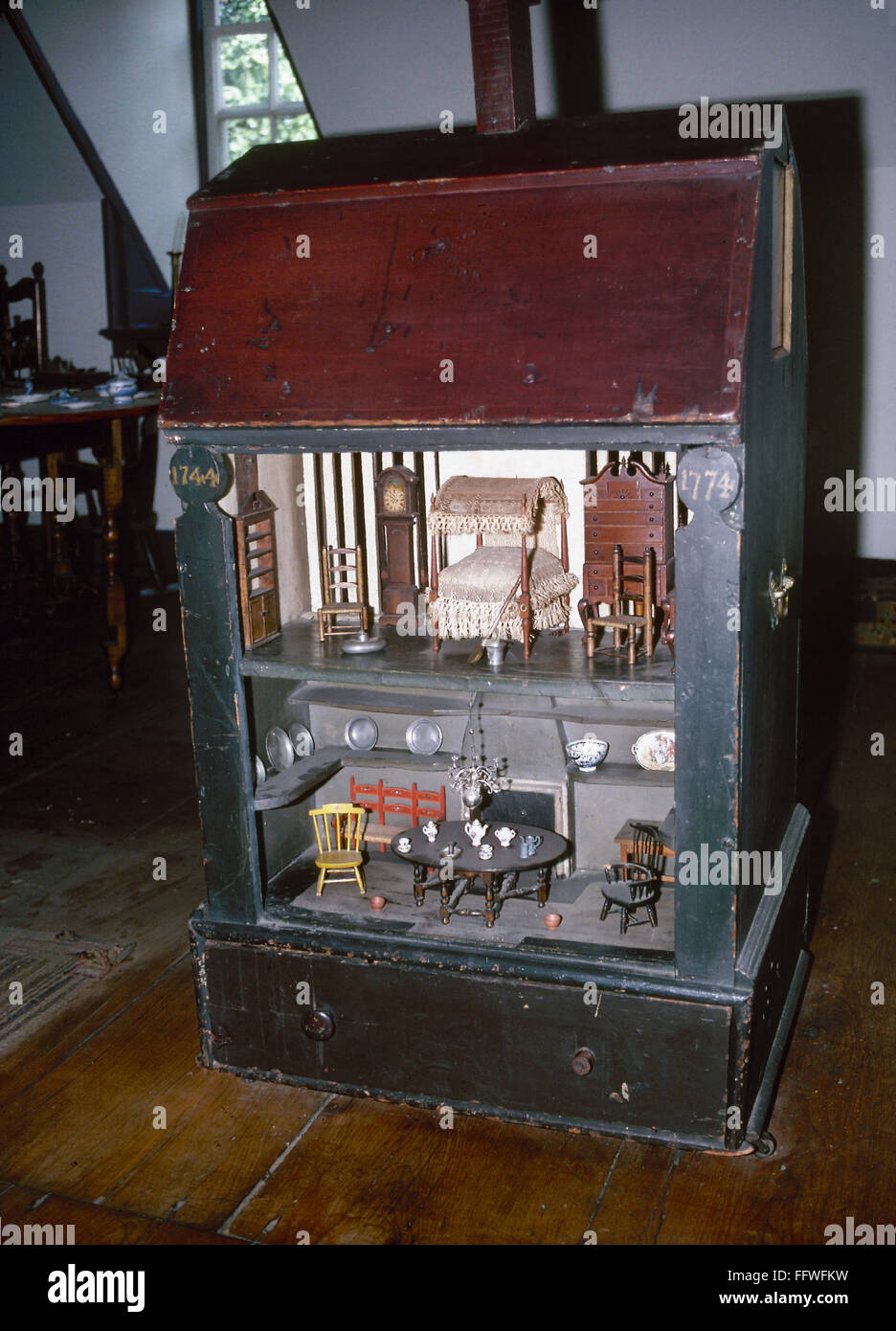 COLONIAL DOLLHOUSE, 1744. /nPainted pine dollhouse manufactured for the ...