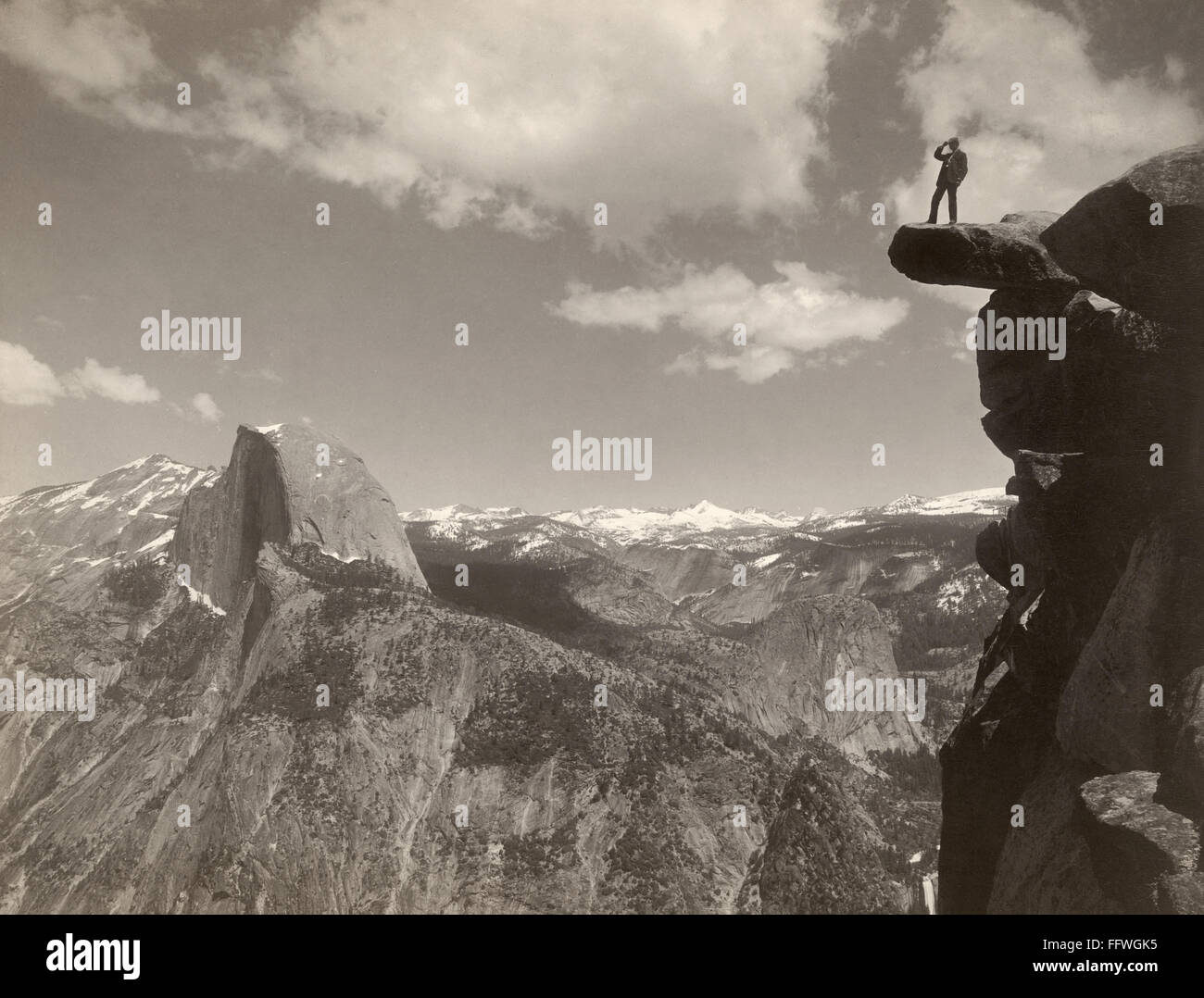YOSEMITE VALLEY, c1901. /nA man standing on a overhanging rock facing ...