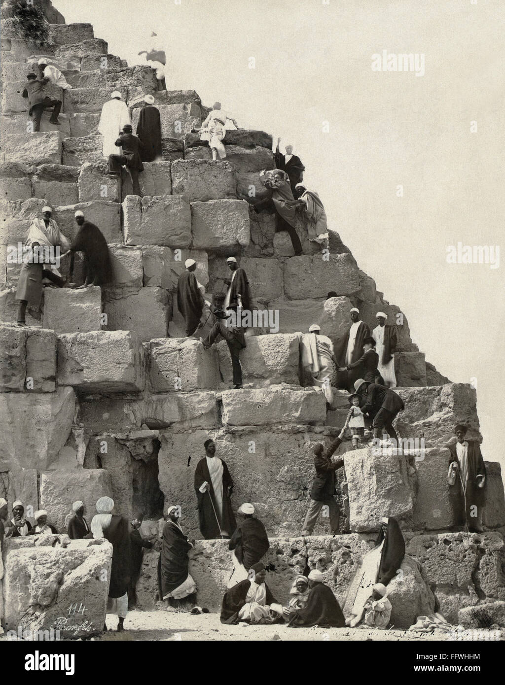 EGYPT: PYRAMID TOURISTS. /nTourists climbing on one of the Great ...
