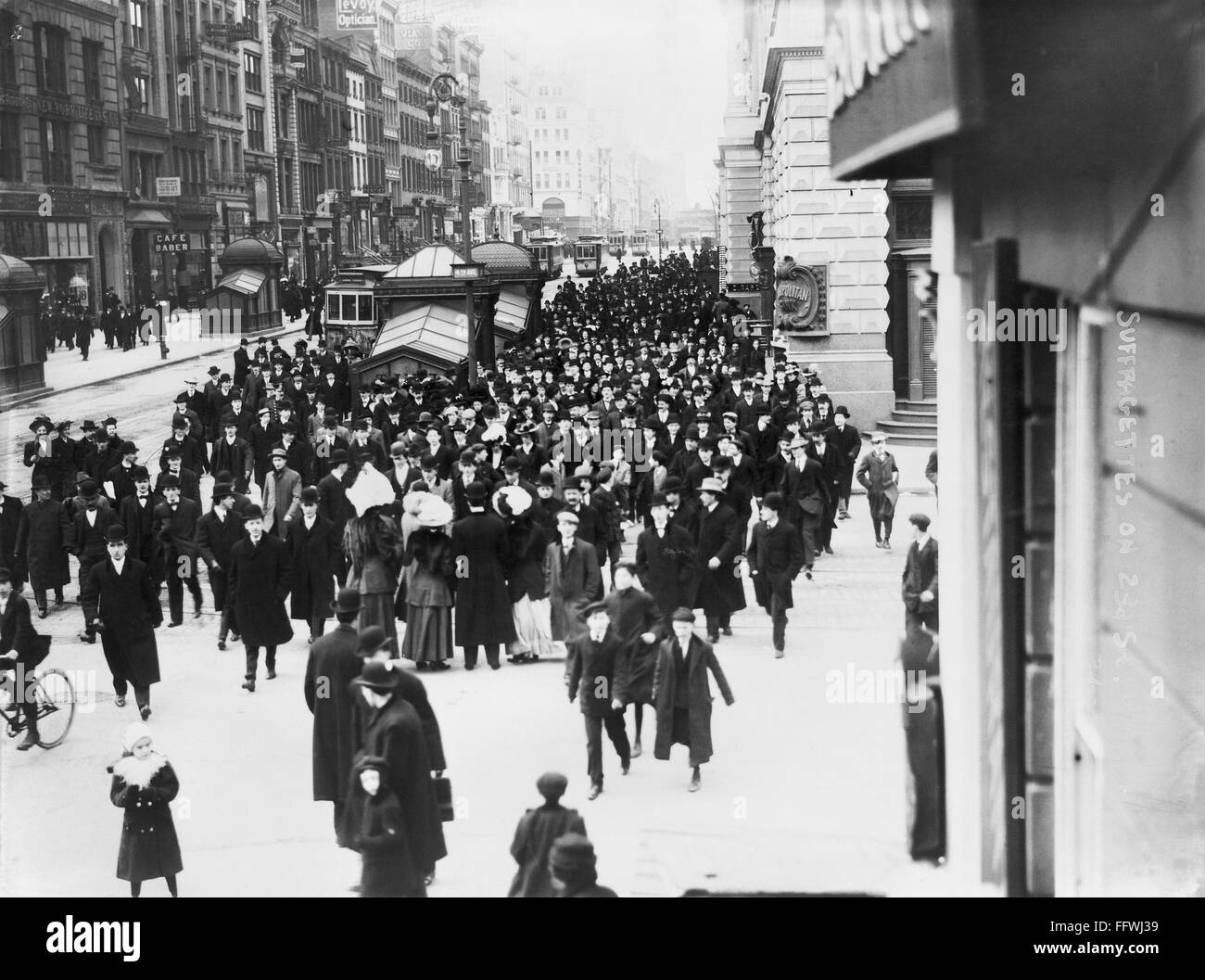 NEW YORK: SUFFRAGETTES. /nSuffragette protest march with crowds of ...