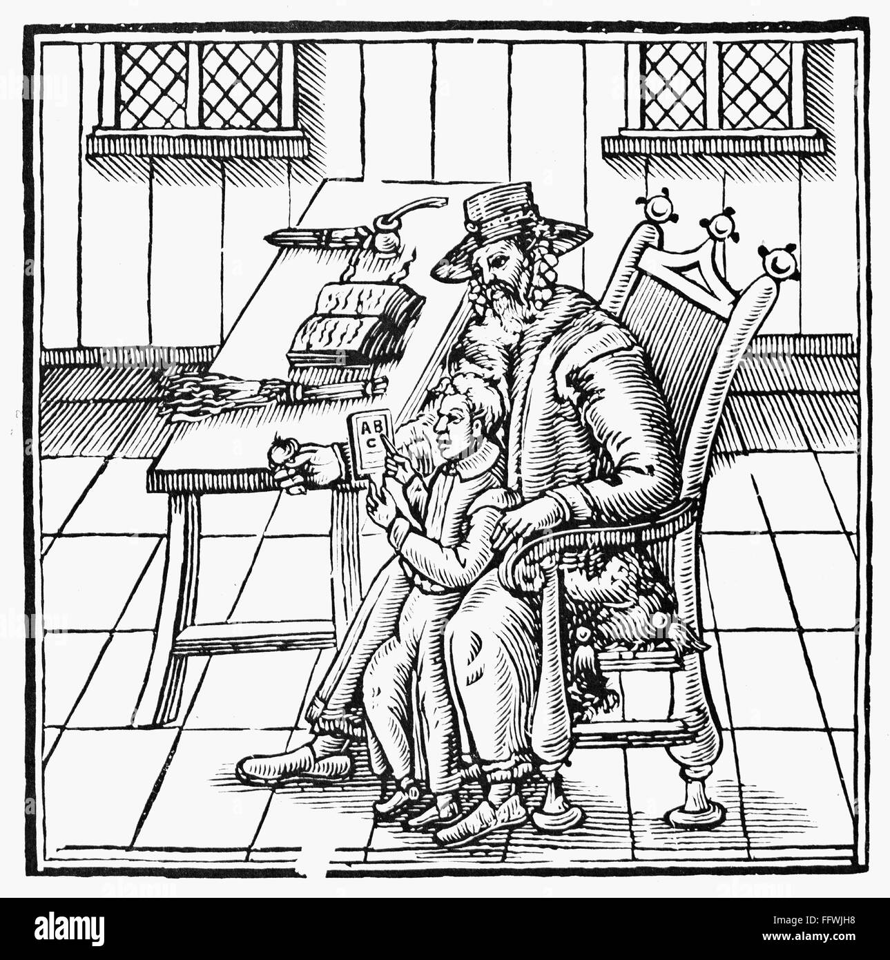 STUDENT & TEACHER. /nA schoolboy being taught to read, using a hornbook ...