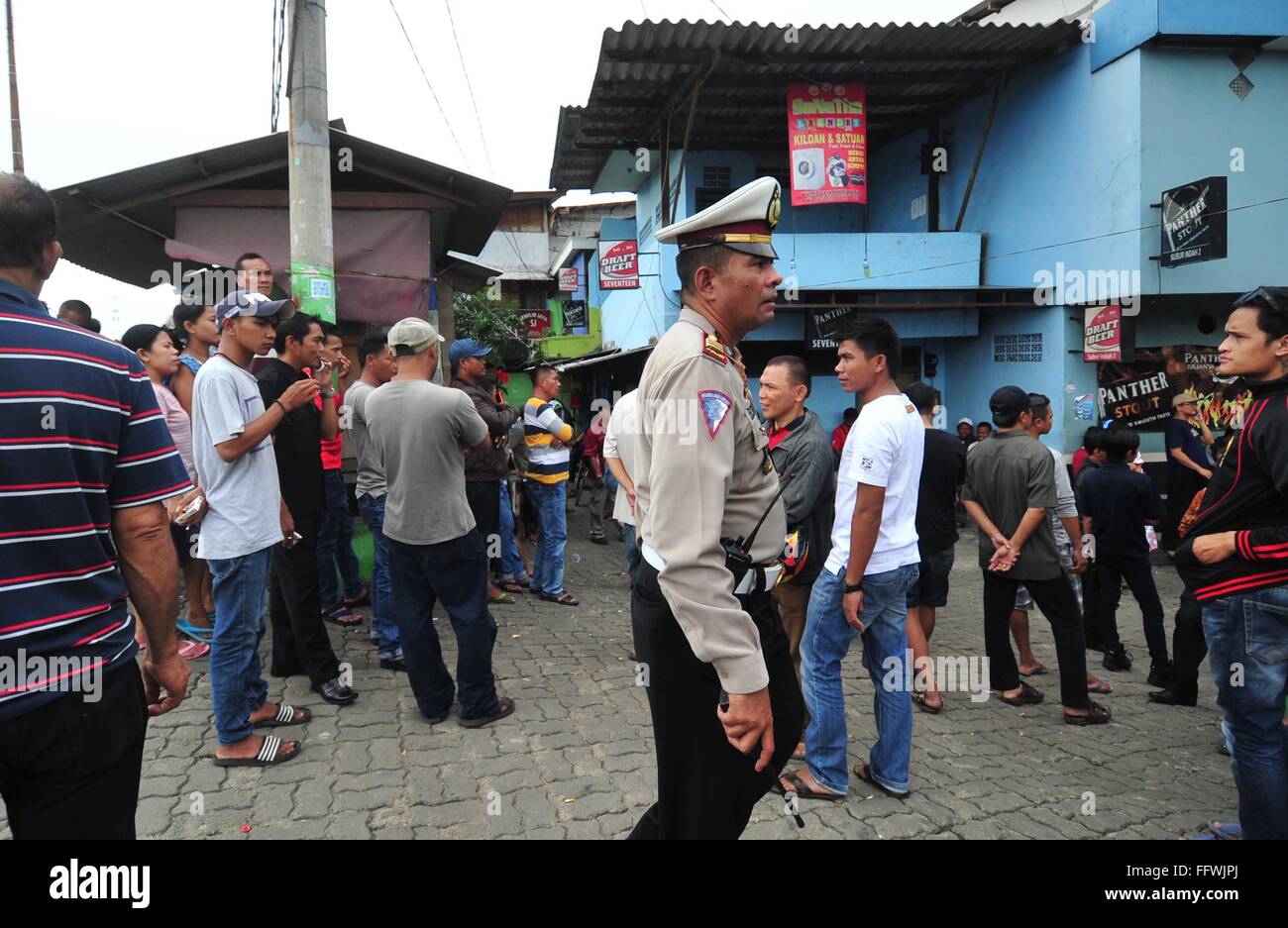 Jakarta, Indonesia. 17th Feb, 2016. People gather in the red-light ...