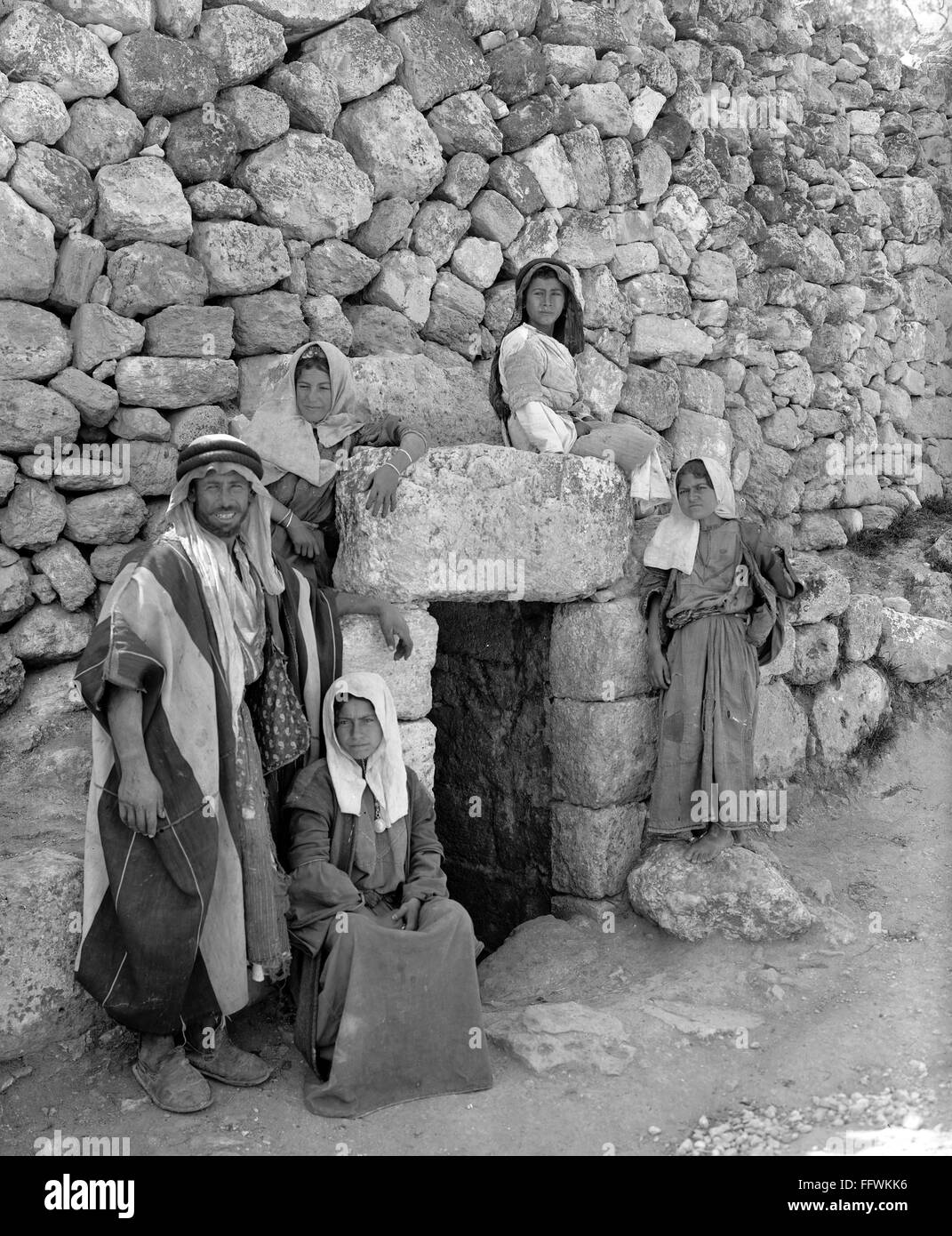 BETHANY: TOMB OF LAZARUS. /nA man and children standing before the tomb ...
