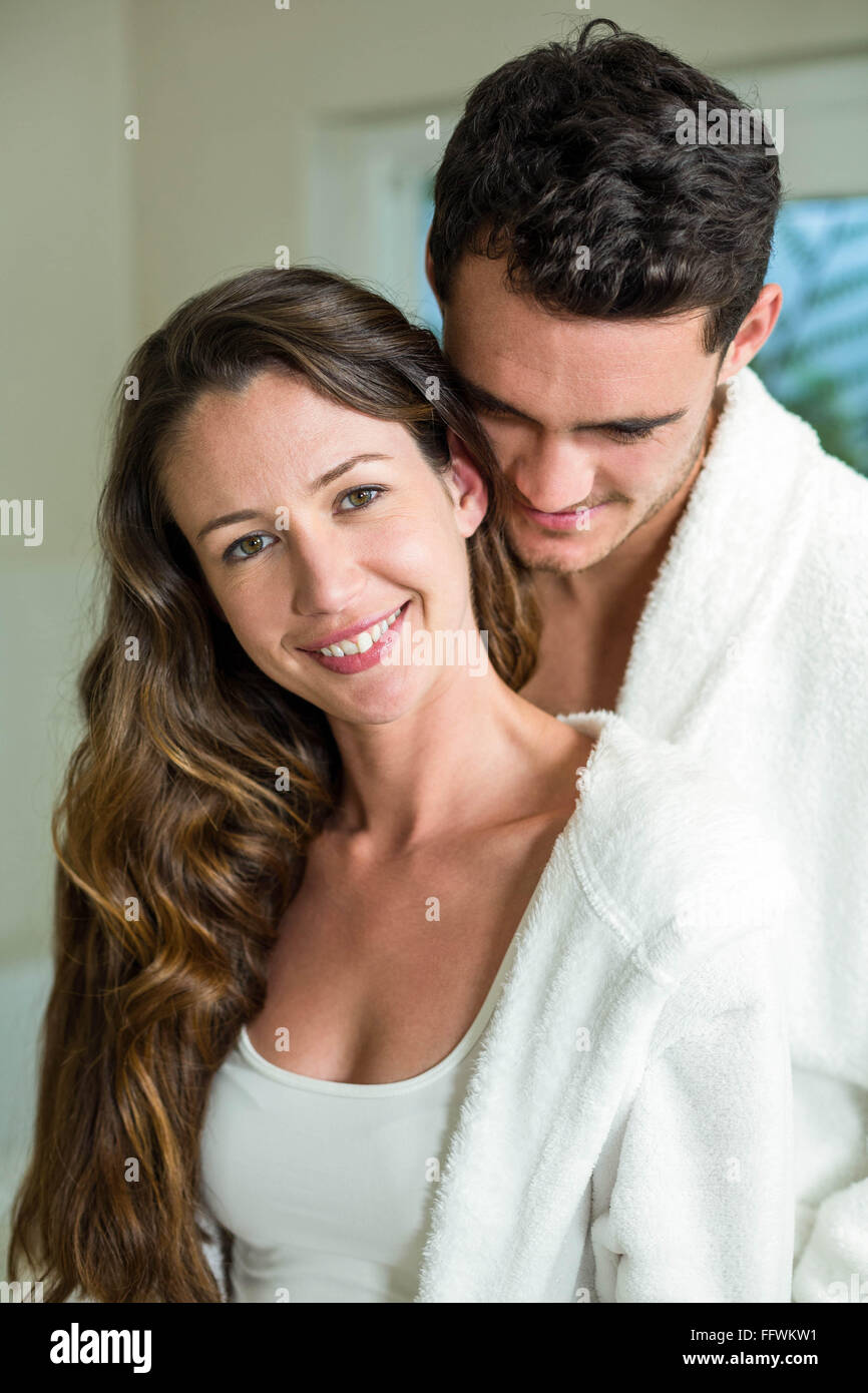 Young couple embracing in bathroom Stock Photo - Alamy