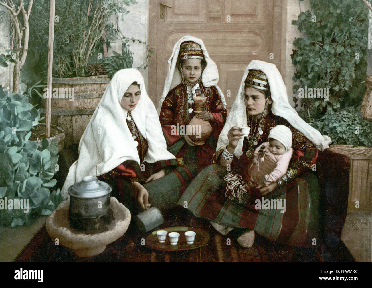 JERUSALEM: TEA SERVICE. /nThree women and a baby in traditional dress ...