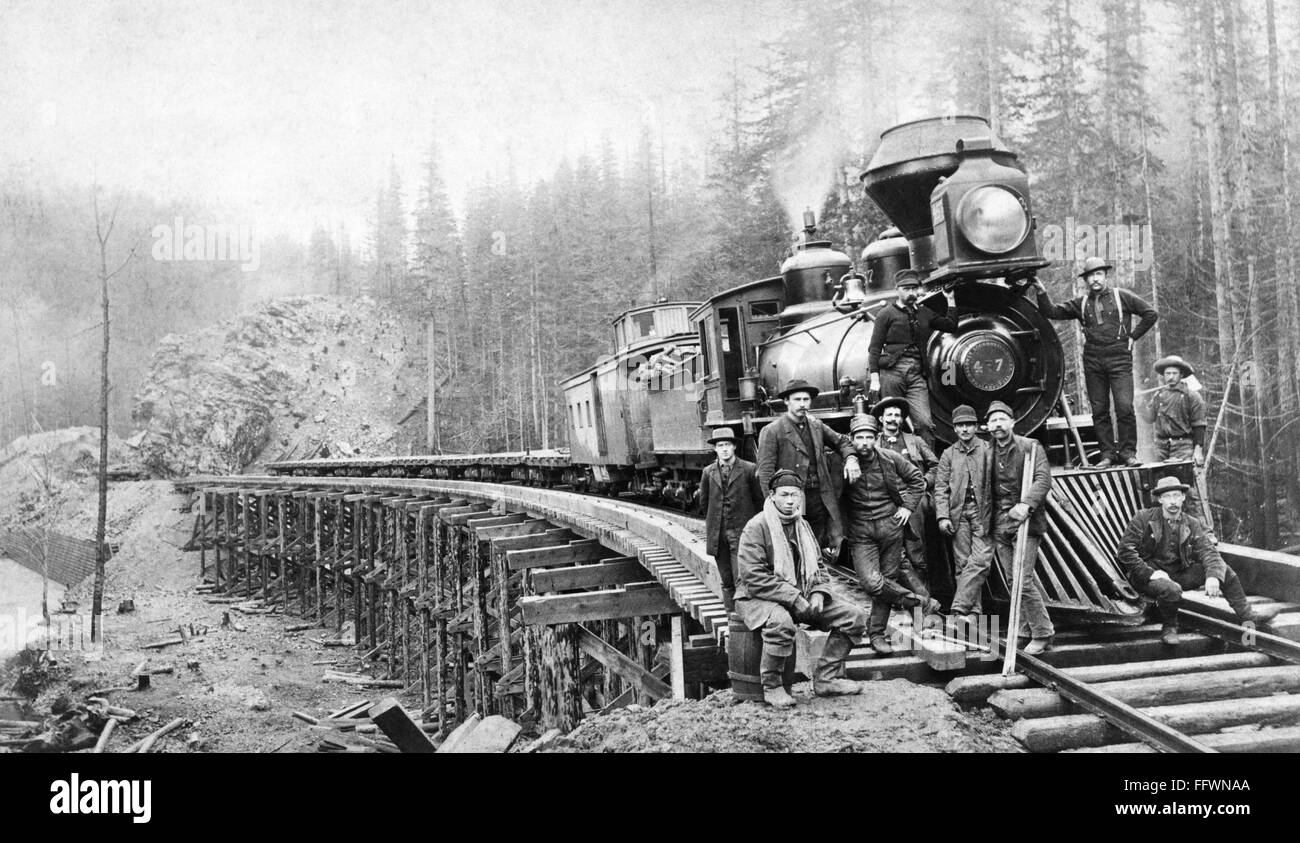 RAILROAD WORKERS, 1880s./nAmerican railroad workers, one of them ...