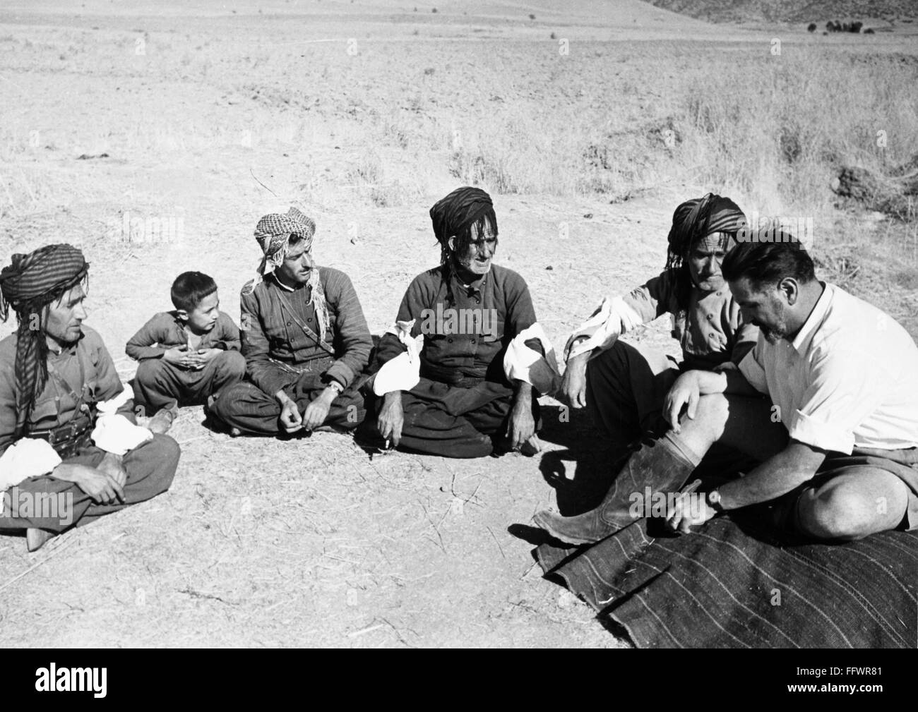 IRAQ: MALARIA, 1958. /nDr. Luigi Mara of Italy (right) meeting with ...