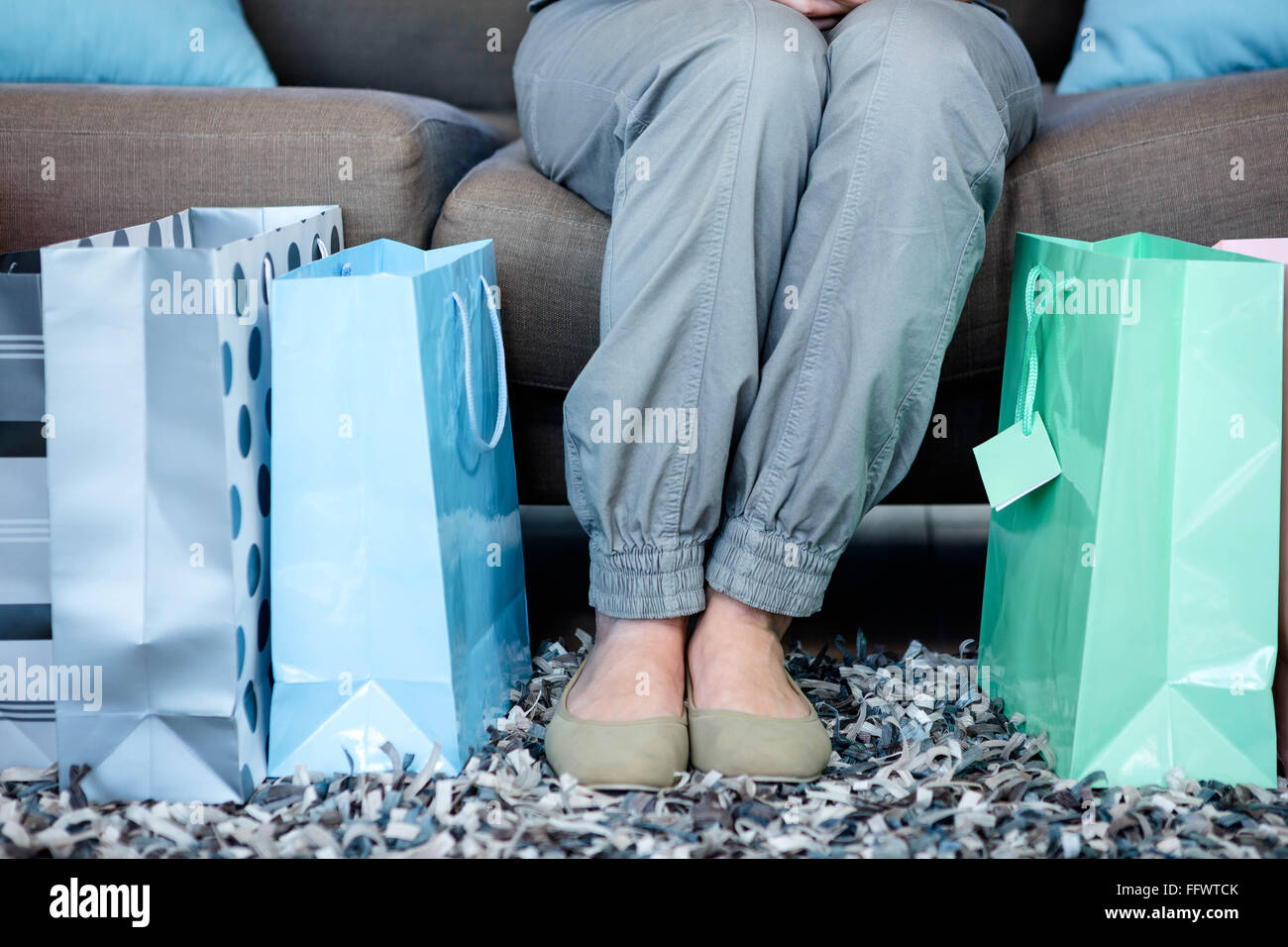 Bags at her feet hi-res stock photography and images - Alamy