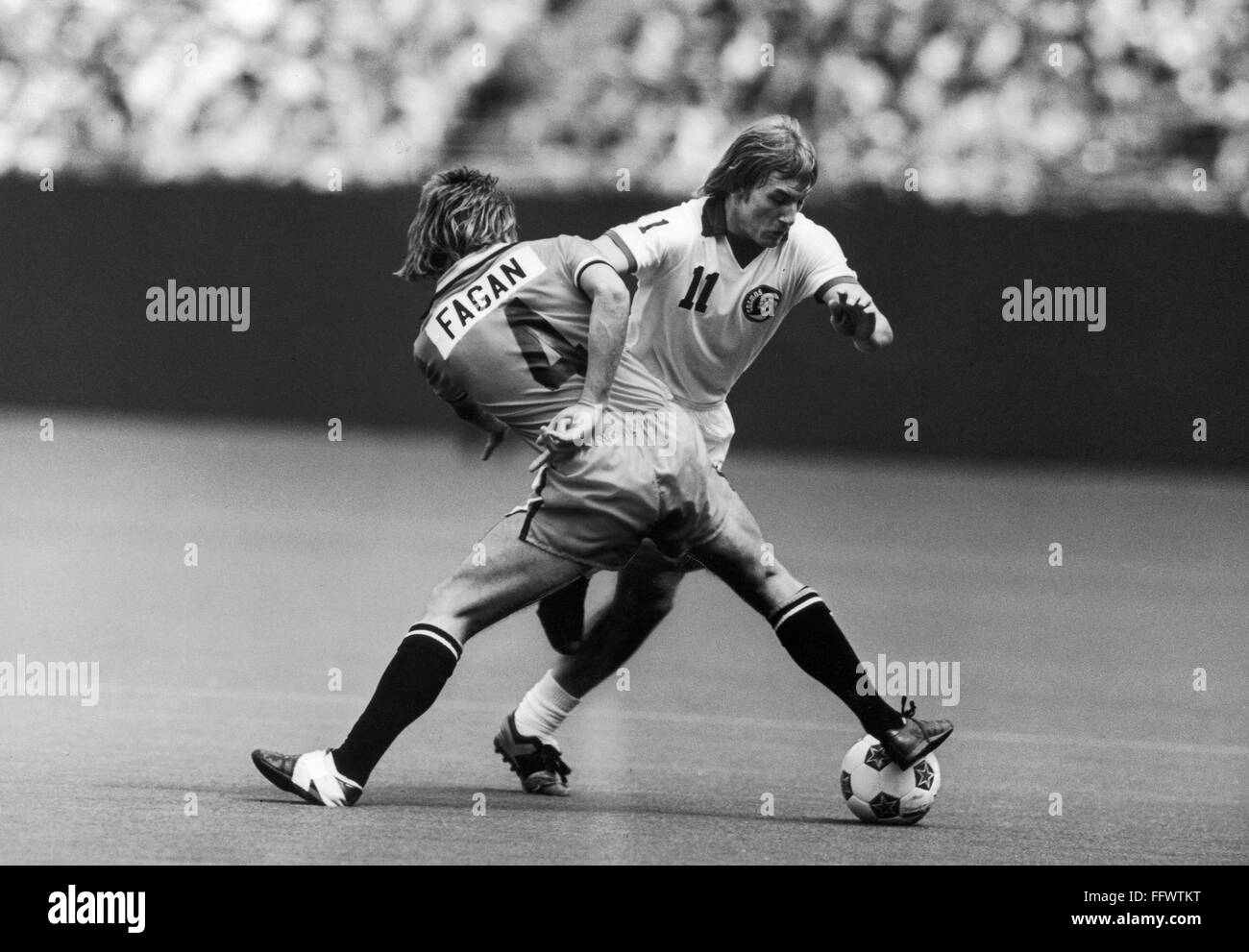 STEPHEN HUNT (1956- ). /nEnglish soccer player. Hunt (right) playing ...