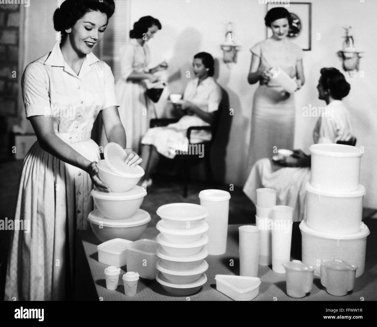 TUPPERWARE PARTY, 1950s. /nA Tupperware party in an American home ...