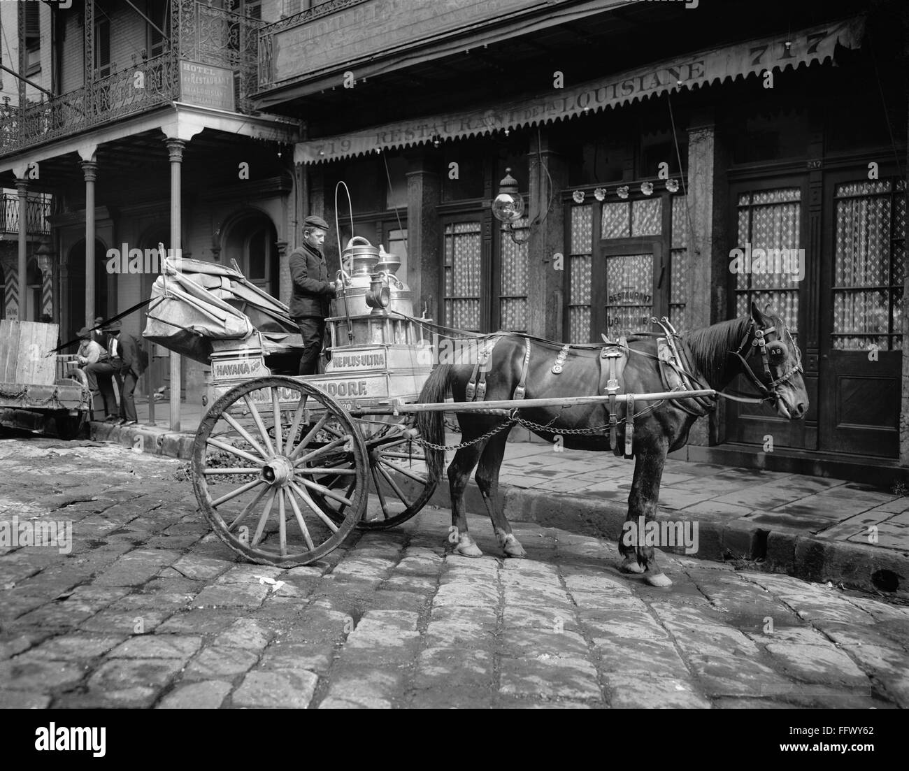 NEW ORLEANS: MILK CART. /nA horse-drawn milk cart outside a restaurant ...