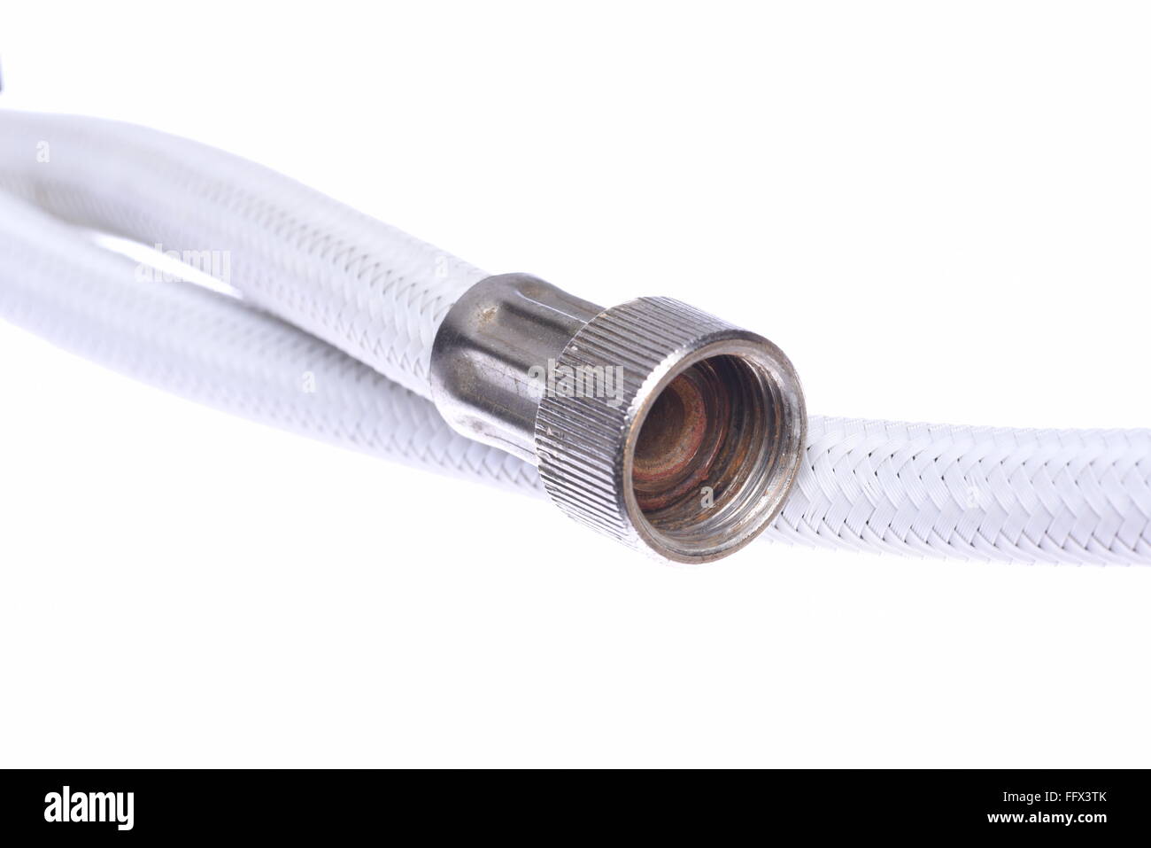 Old flexible metal hose pipe isolated on with white background Stock ...