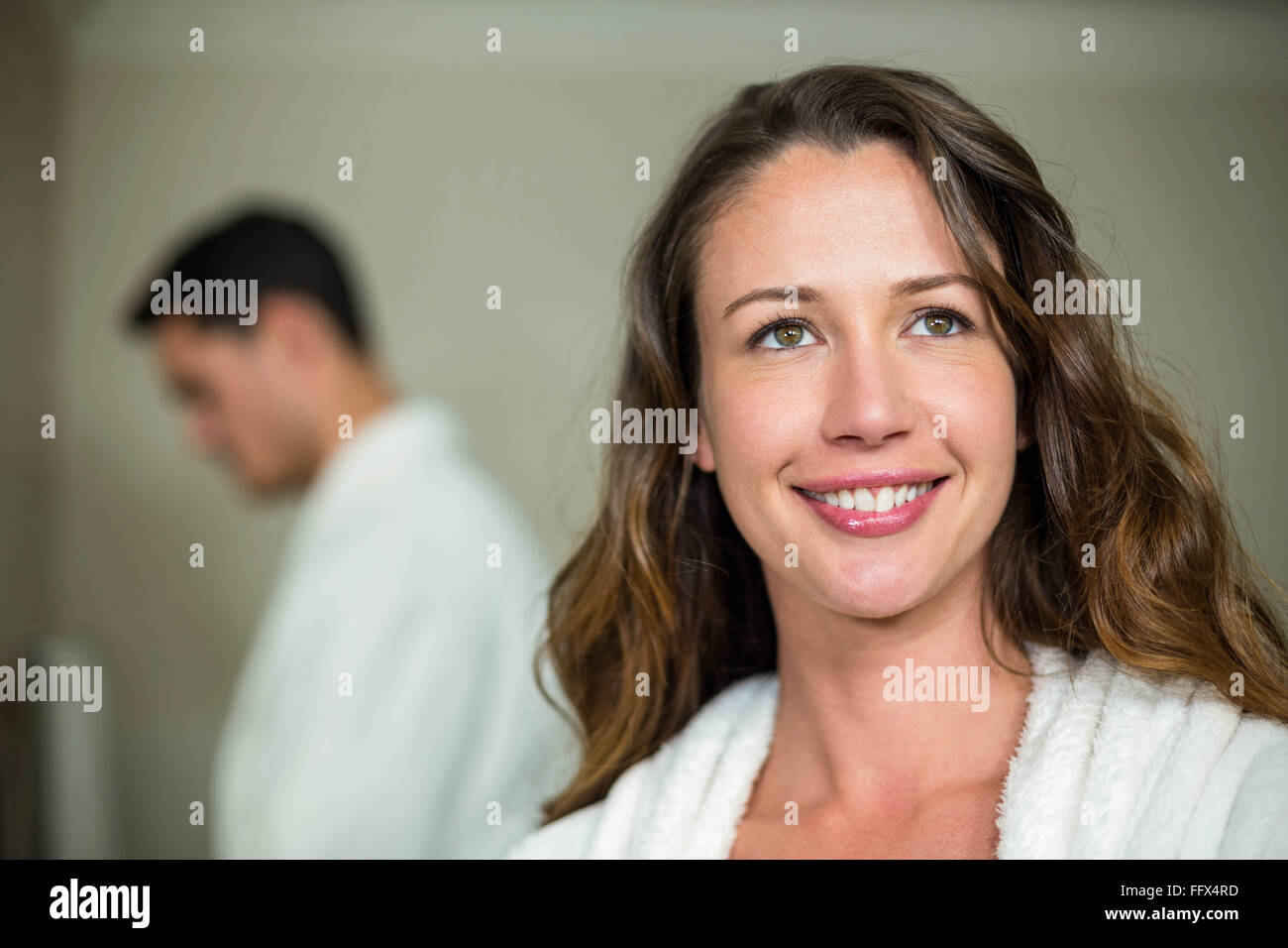 Beautiful woman smiling at camera Stock Photo - Alamy