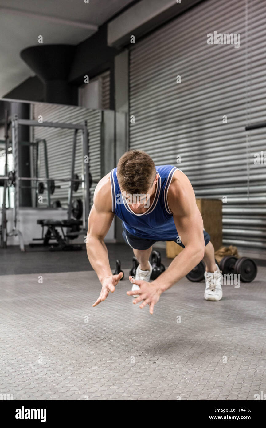 Muscular man doing push up Stock Photo - Alamy