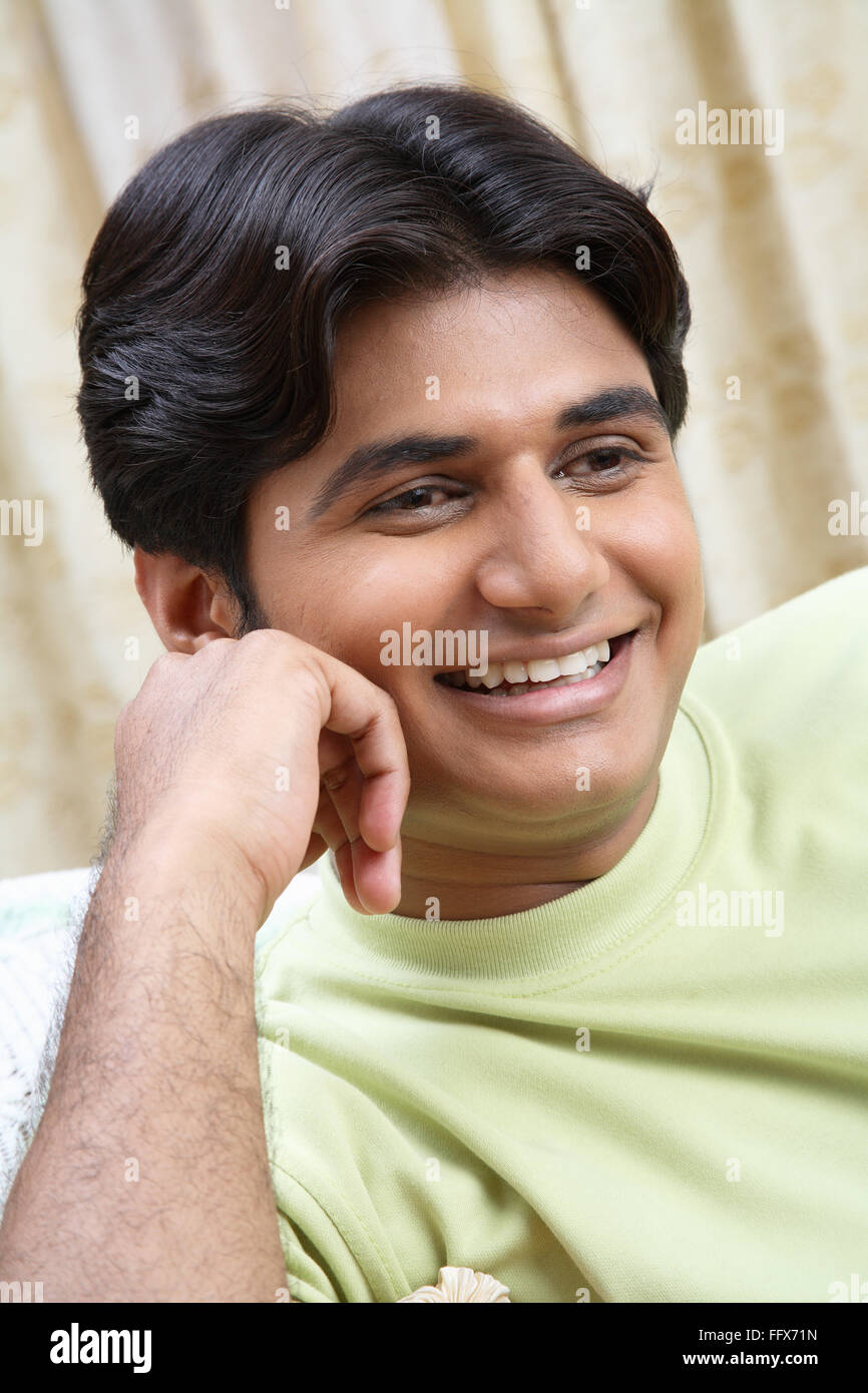 man with hand on cheek, MR#687C Stock Photo - Alamy
