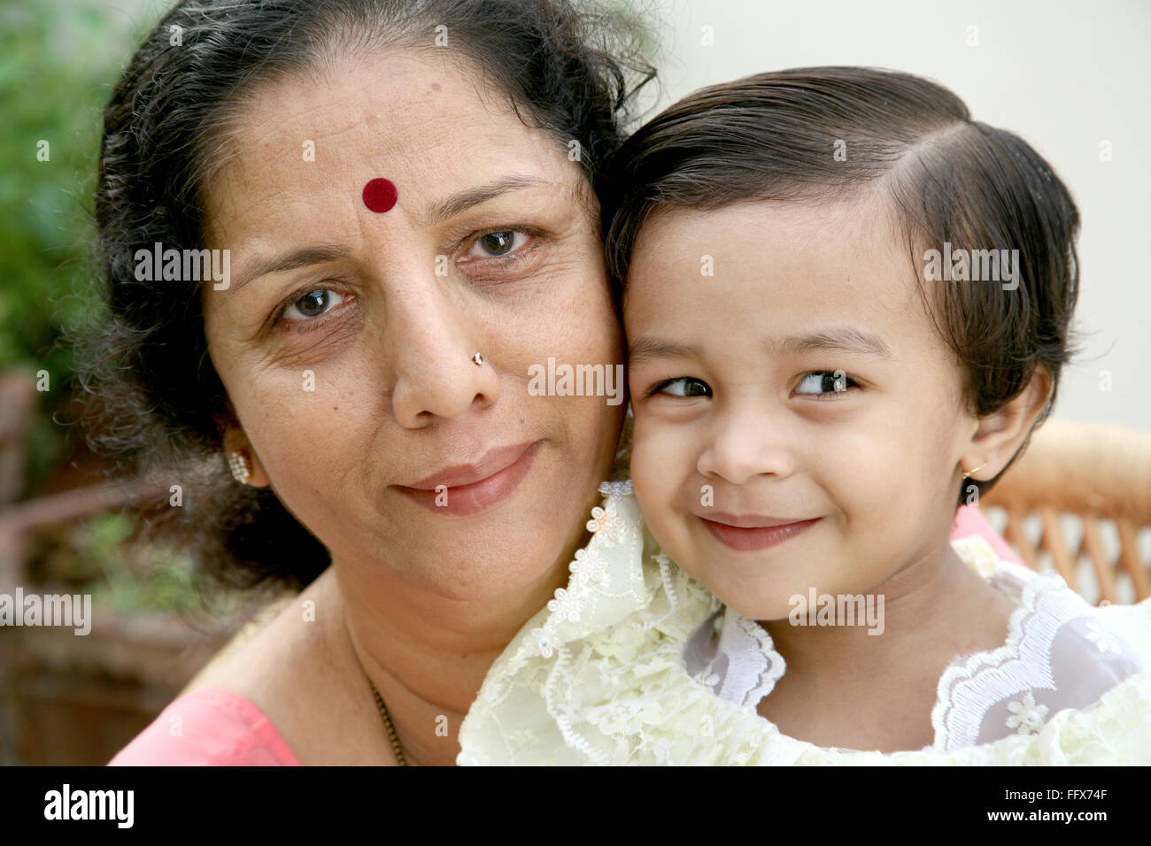 Grand Mother and grand daughter both smiling MR # 687G and 687K Stock ...