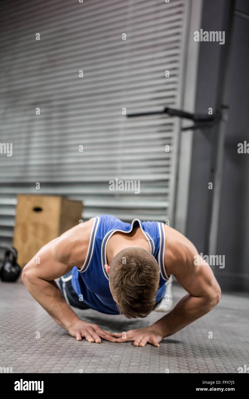 Muscular man doing push up Stock Photo - Alamy