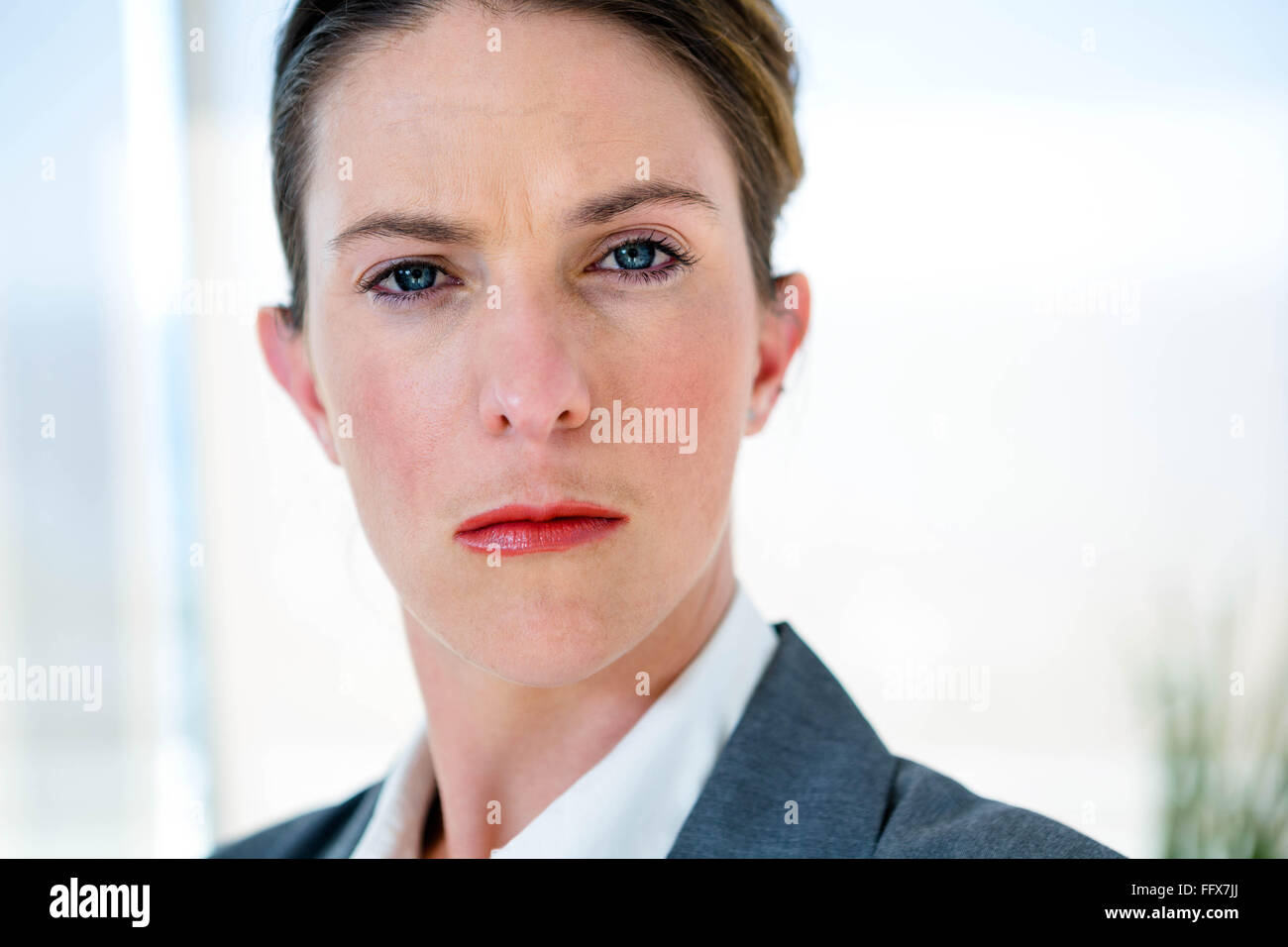 business woman staring into the camera Stock Photo - Alamy