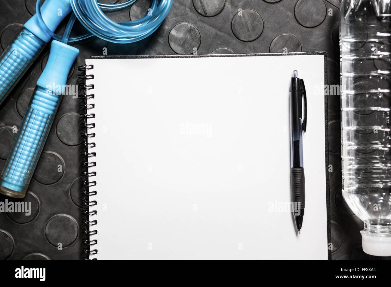 Notepad, rope and bottle Stock Photo - Alamy