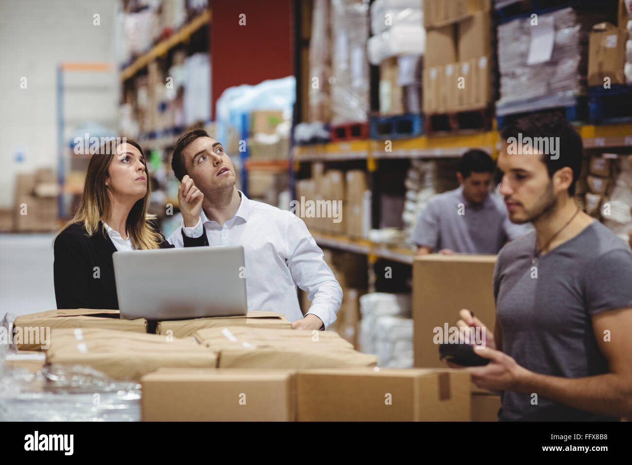 Portrait of smiling warehouse managers Stock Photo - Alamy