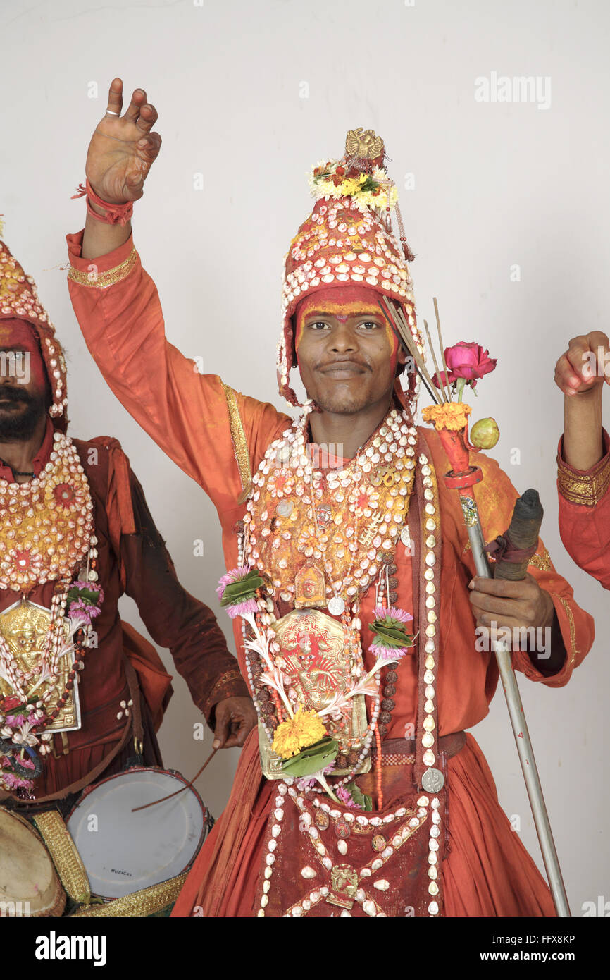 Gondhali from Sholapur District playing drums , Maharashtra , India MR ...