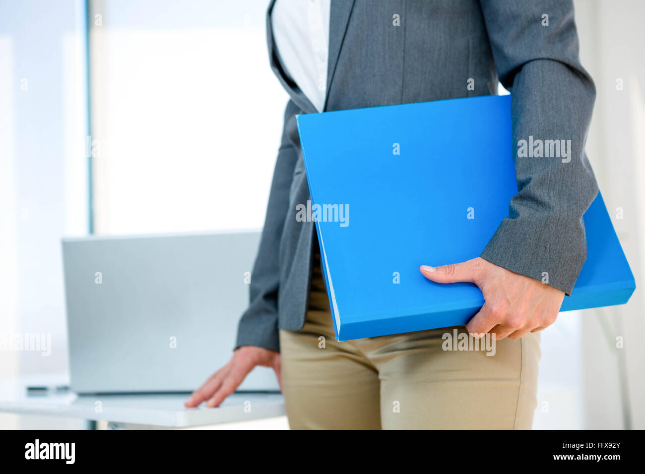 Carrying a binder hi-res stock photography and images - Alamy