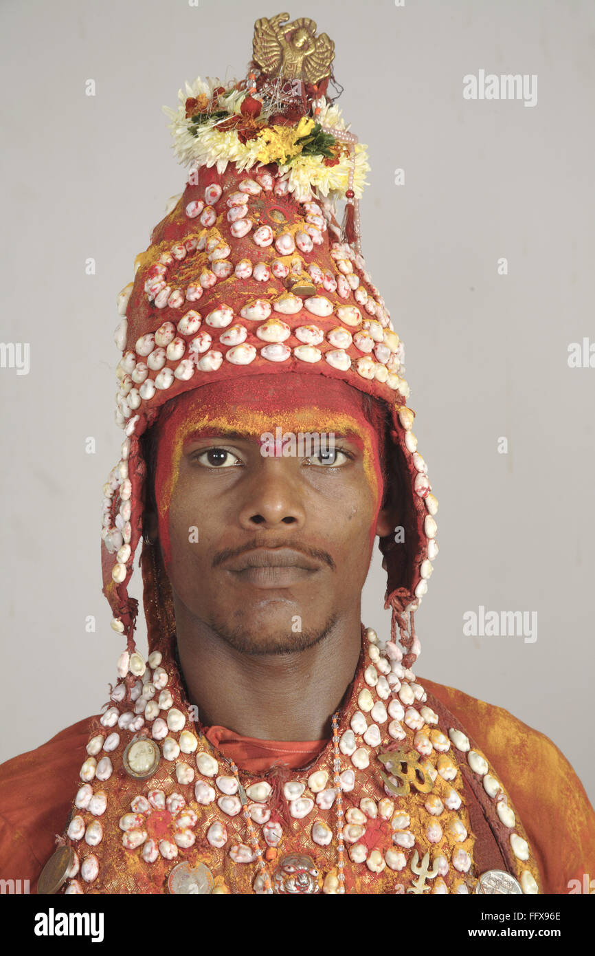 Gondhali from Sholapur District looking at camera , Maharashtra , India ...