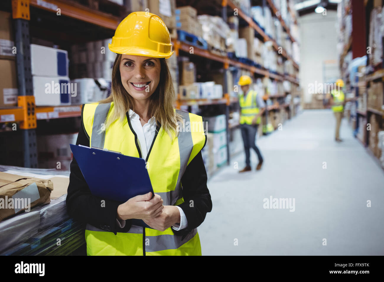 Portrait of smiling warehouse manager Stock Photo - Alamy