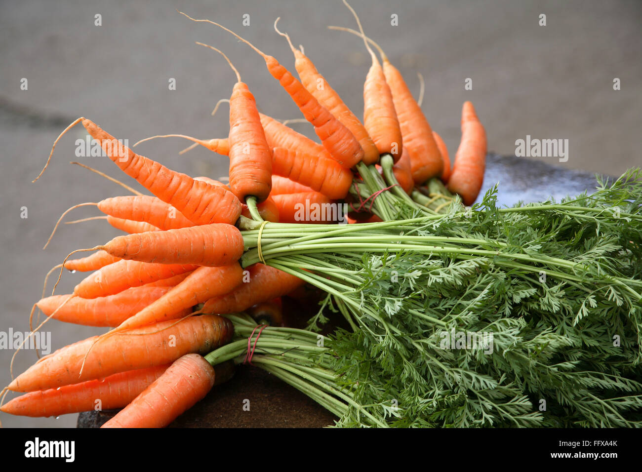 Carrots with green leaves for sale, Munnar, Kerala, India, Asia Stock ...