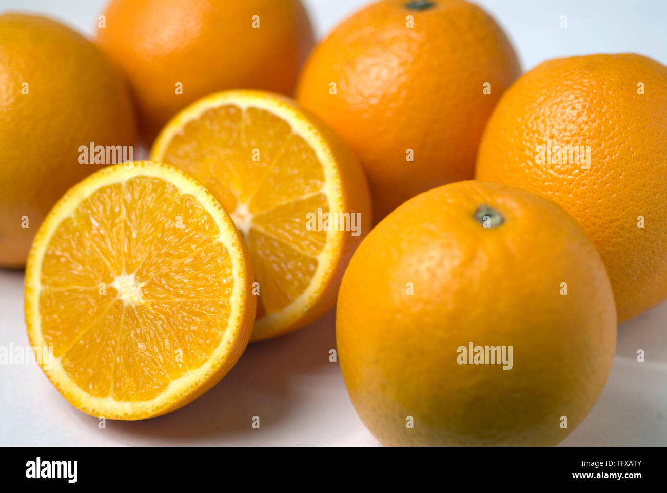 Orange fruit round citrus few cut in half white background Stock Photo ...