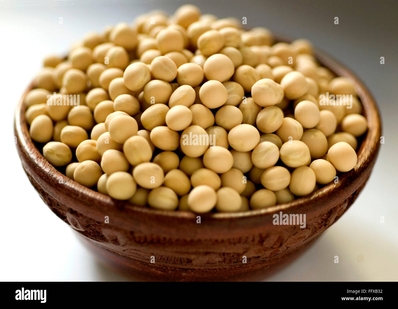 White peas dried round many in round wooden bowl vegetable Stock Photo ...