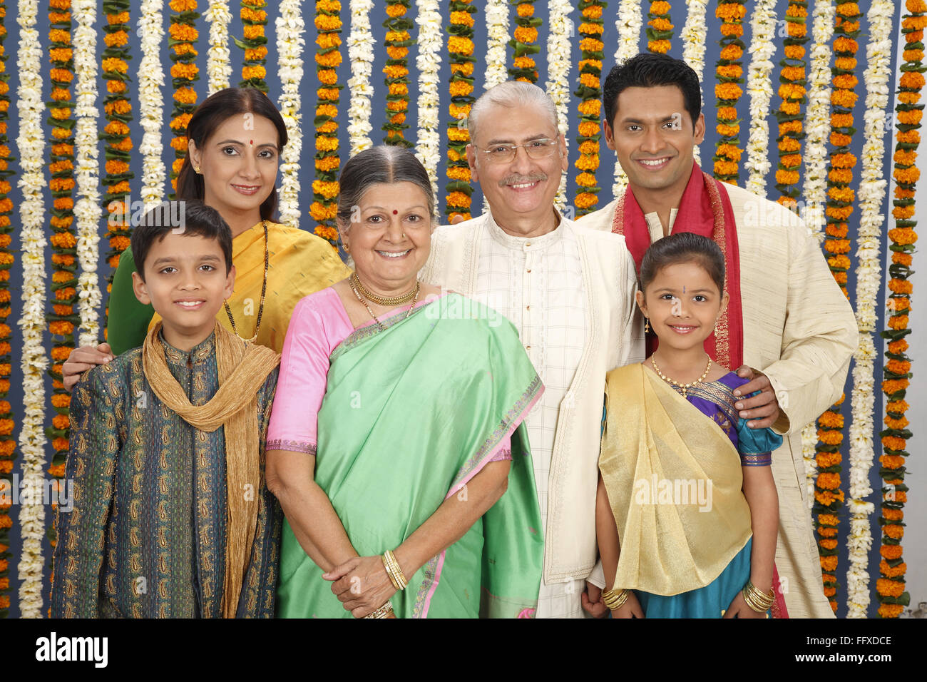 Parent children grandparent grandchildren in traditional dress wearing ...