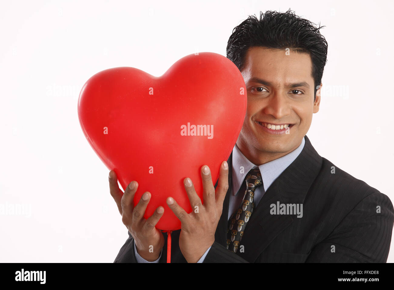 Indian hands holding heart shape hi-res stock photography and images ...