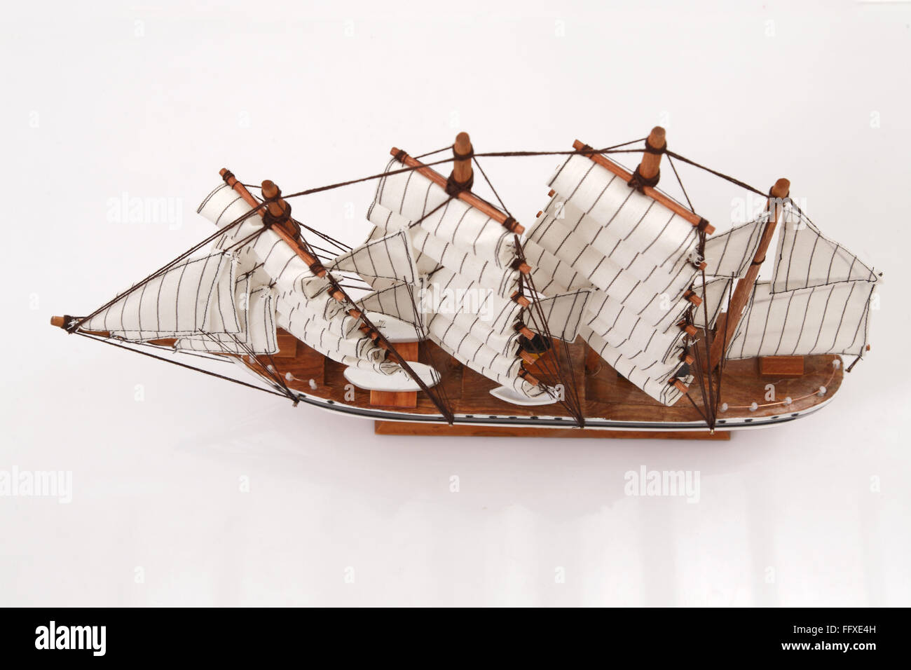 sailing boat replica model toy on white background Stock Photo - Alamy