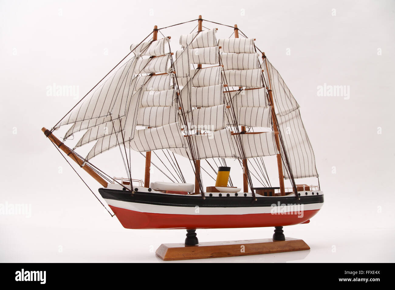 sailing boat replica model toy on white background Stock Photo - Alamy
