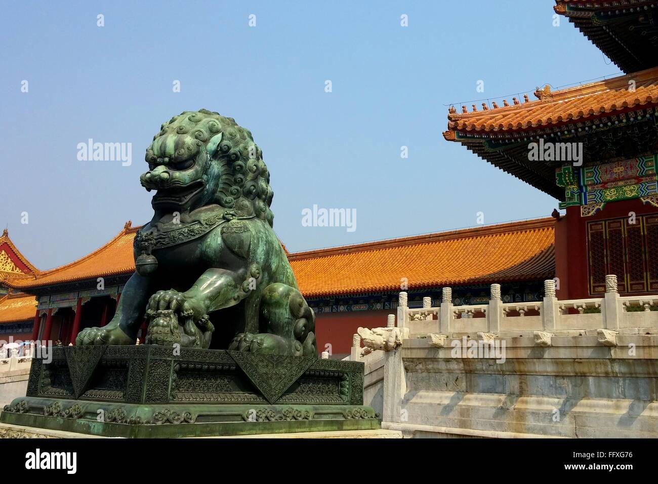 Imperial Guardian Lion Statue Against Temple Stock Photo - Alamy
