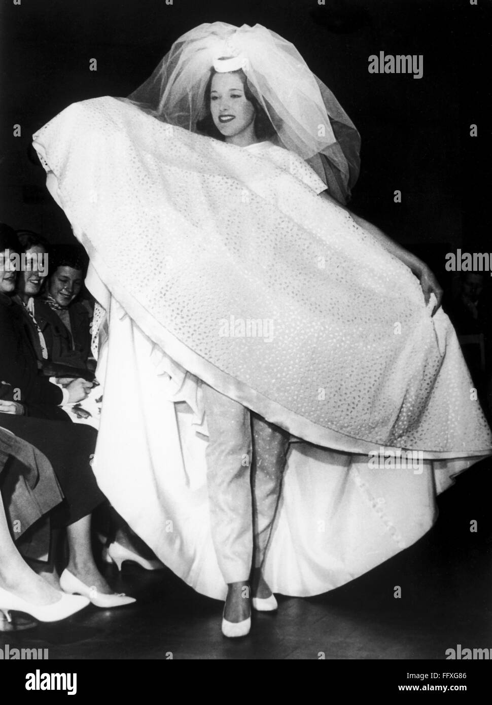 BEATNIK WEDDING GOWN, 1960. /nModel showing a wedding attire with blue ...