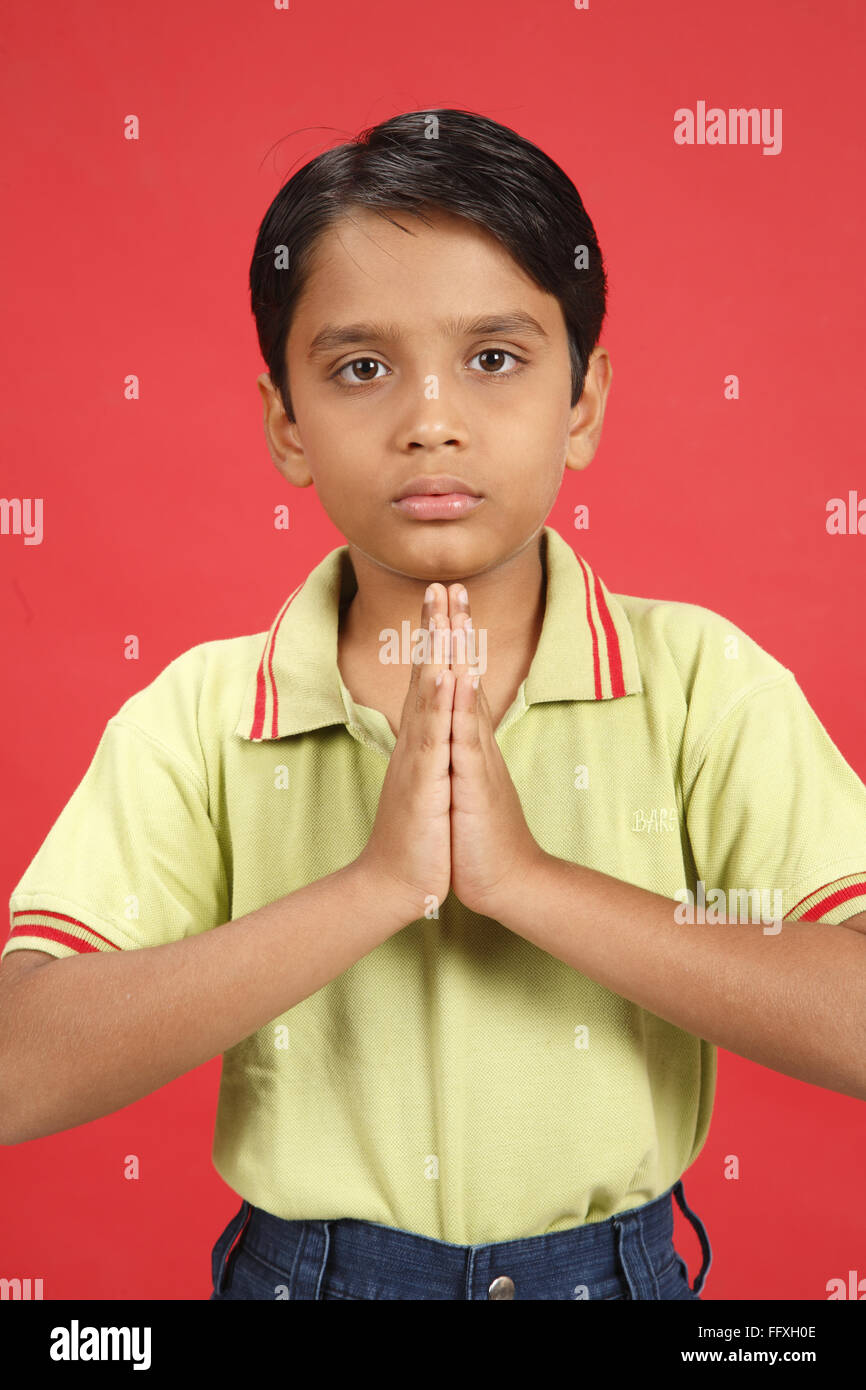 South indian children welcome standing hi-res stock photography and ...