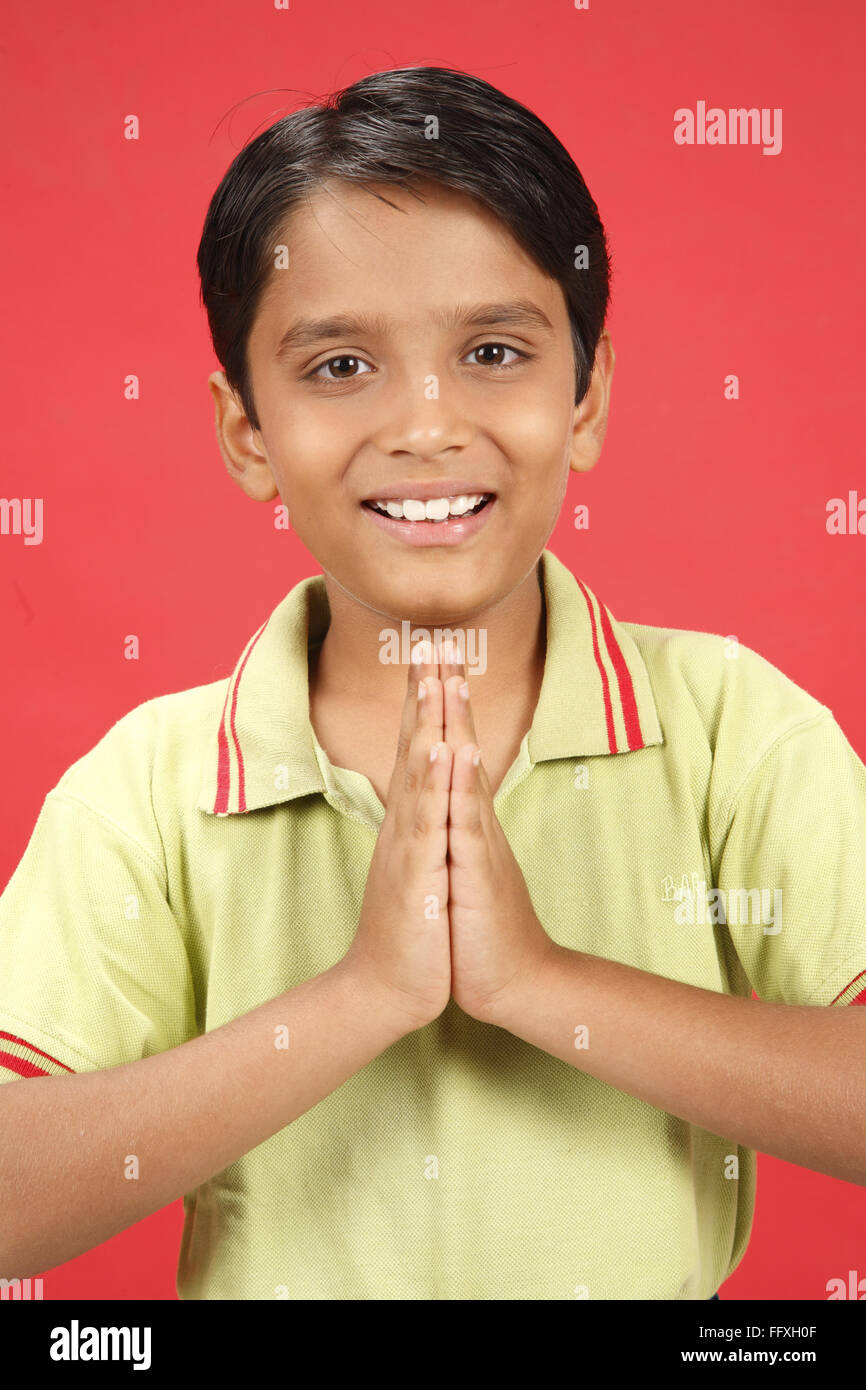 South indian children welcome standing hi-res stock photography and ...
