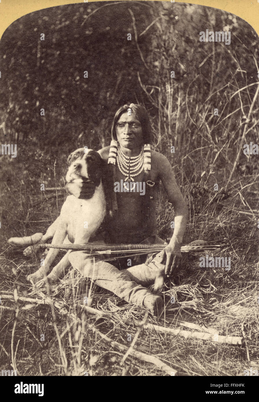 UTE MAN WITH DOG, c1874. /nA young Ute man with his dog, in Utah ...