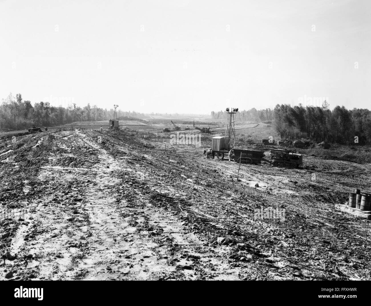 LEVEE CONSTRUCTION, 1935. /nConstruction of levees using tractor-drawn ...
