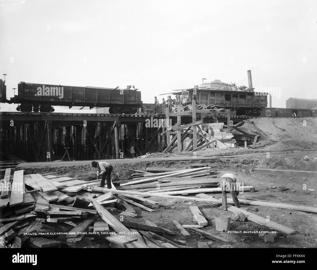RAILROAD WORKERS, 1901. /nConstruction workers building an elevated ...