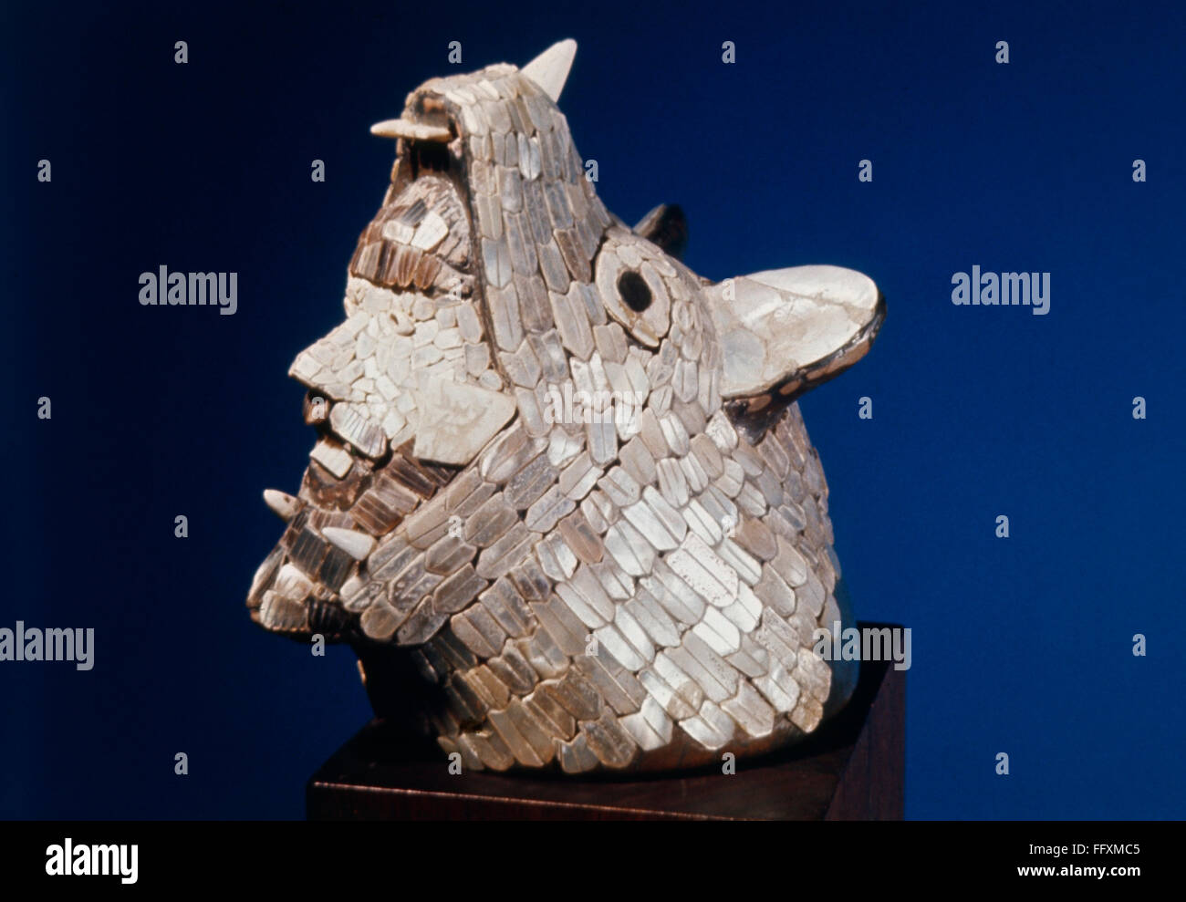 TOLTEC WARRIOR. /nMother of pearl mosaic sculpture of an animal head ...