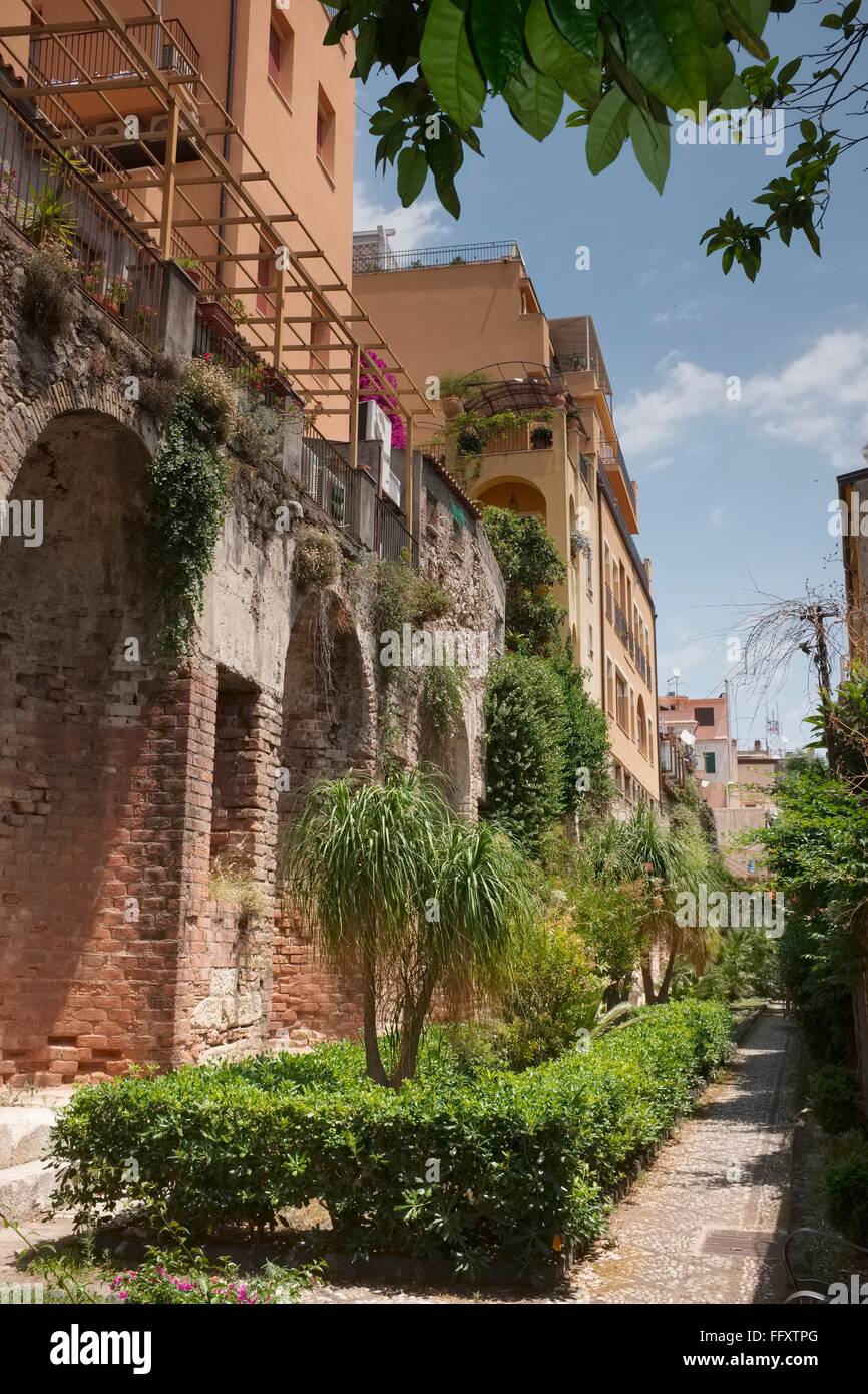 Roman ruins acting as foundations for later buildings in the hiltp town ...