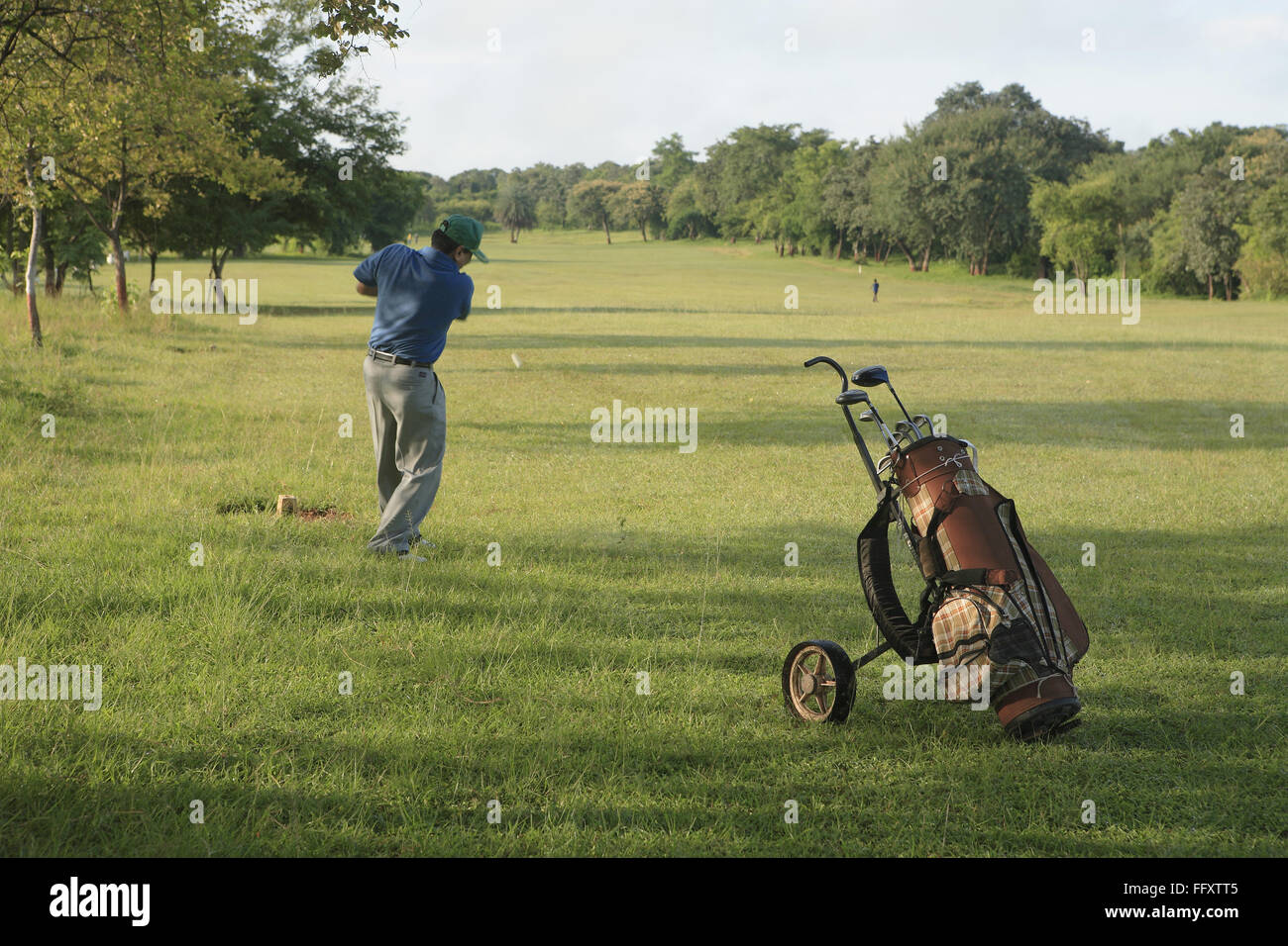 People playing golf at golf course MR # 372 Stock Photo - Alamy