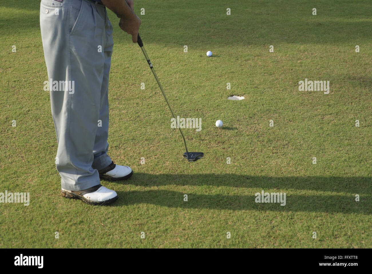 People playing golf in perfection at golf course MR # 372 Stock Photo ...