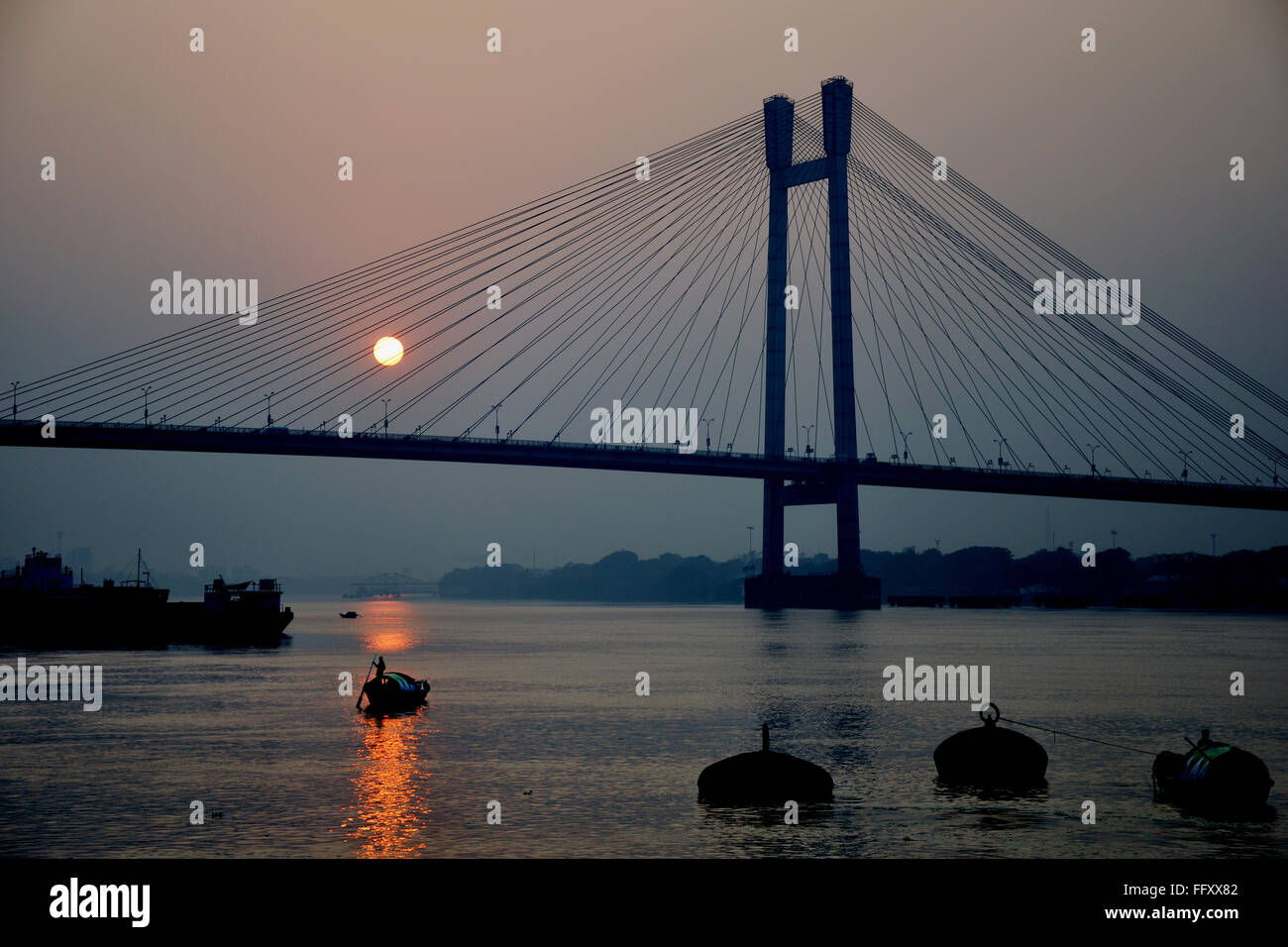 Howrah bridge sunset hi-res stock photography and images - Alamy