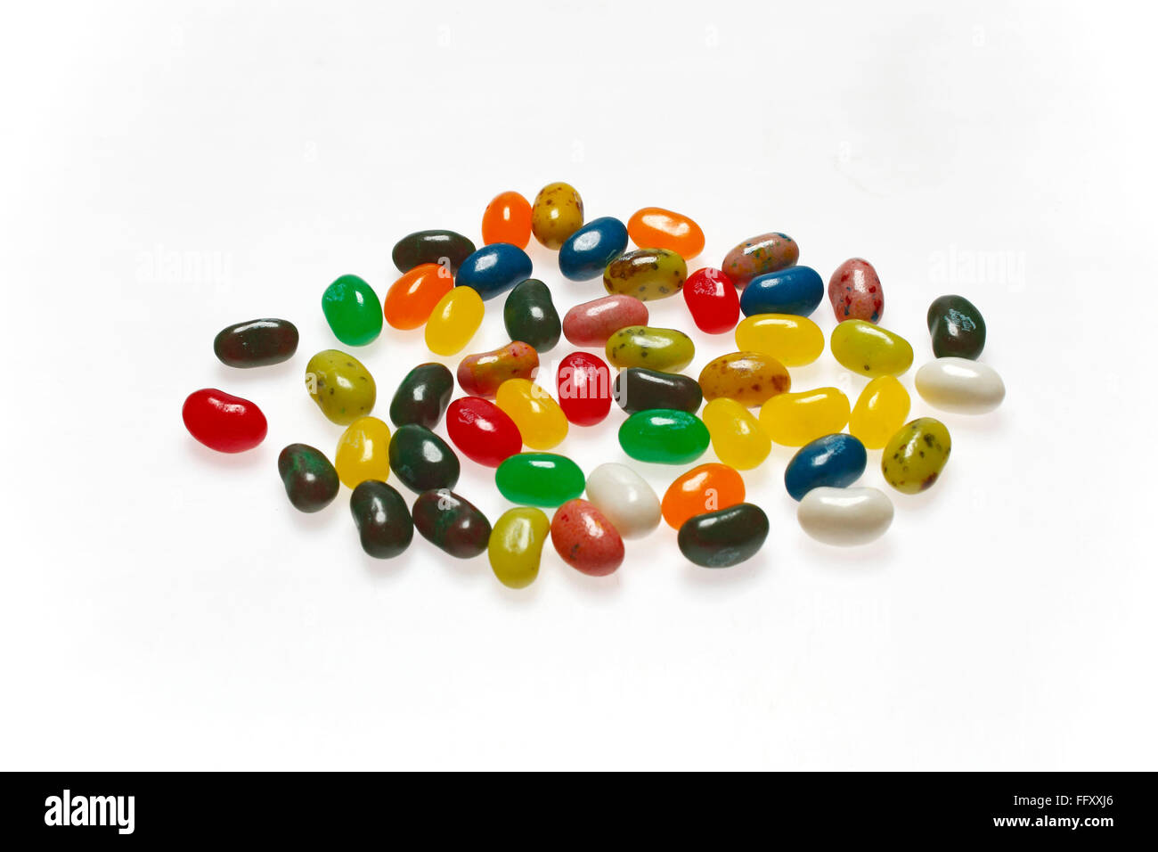 Jelly beans scattered on white background Stock Photo - Alamy